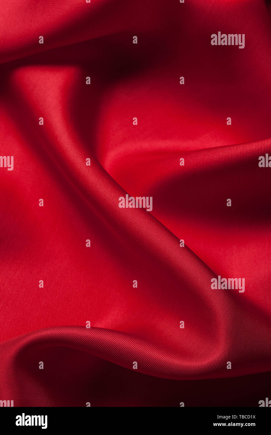 Red cloth waves background texture Stock Photo - Alamy
