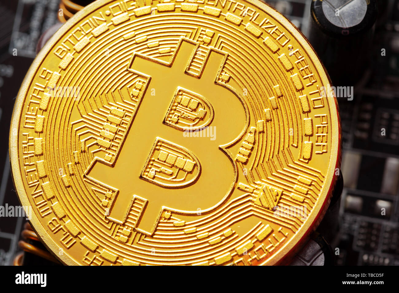 Bitcoin and a computer graphic card Stock Photo - Alamy