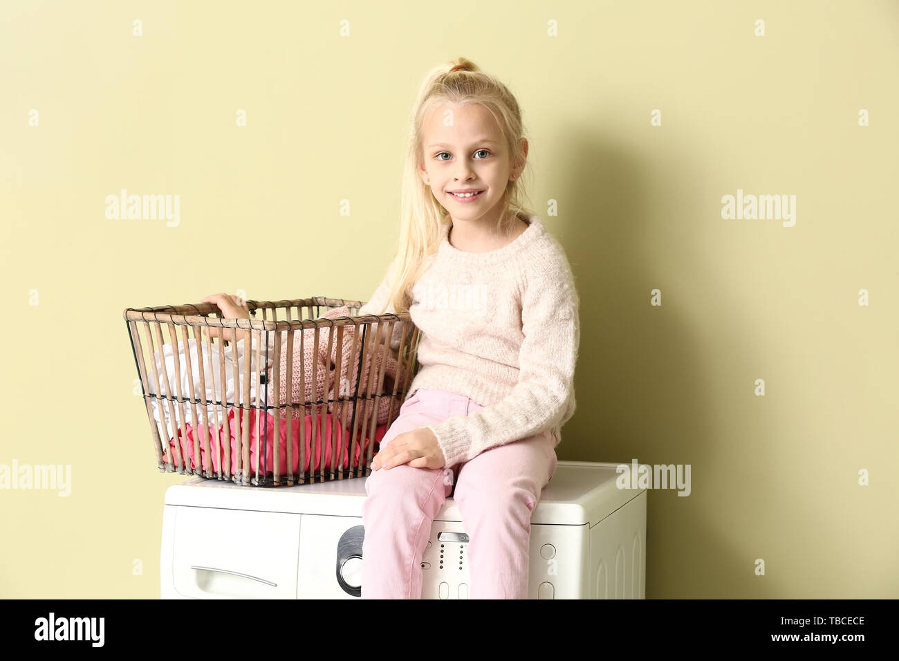 Girl Sitting On Washing Machine High Resolution Stock Photography and ...