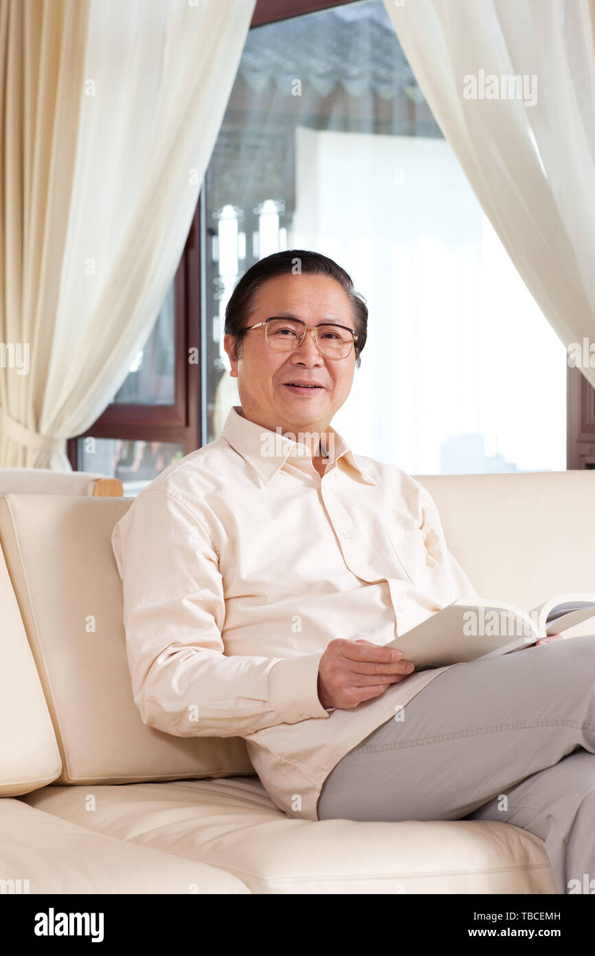 The elderly read books and enjoy their old age Stock Photo - Alamy