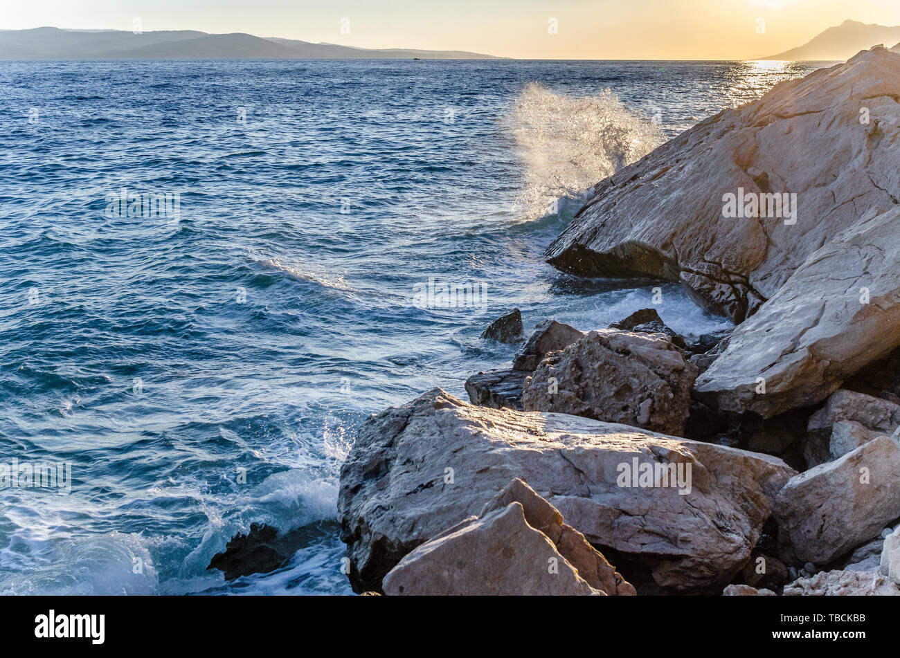 Sunset with rocks and sand hi-res stock photography and images - Alamy