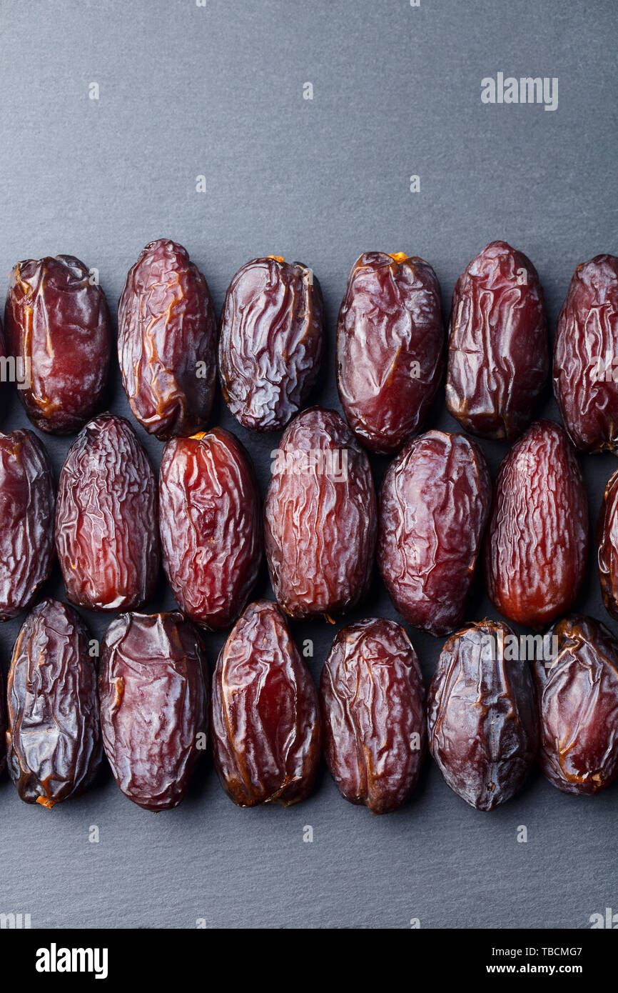 Fresh Medjool Dates. Slate background. Copy space. Top view Stock Photo ...