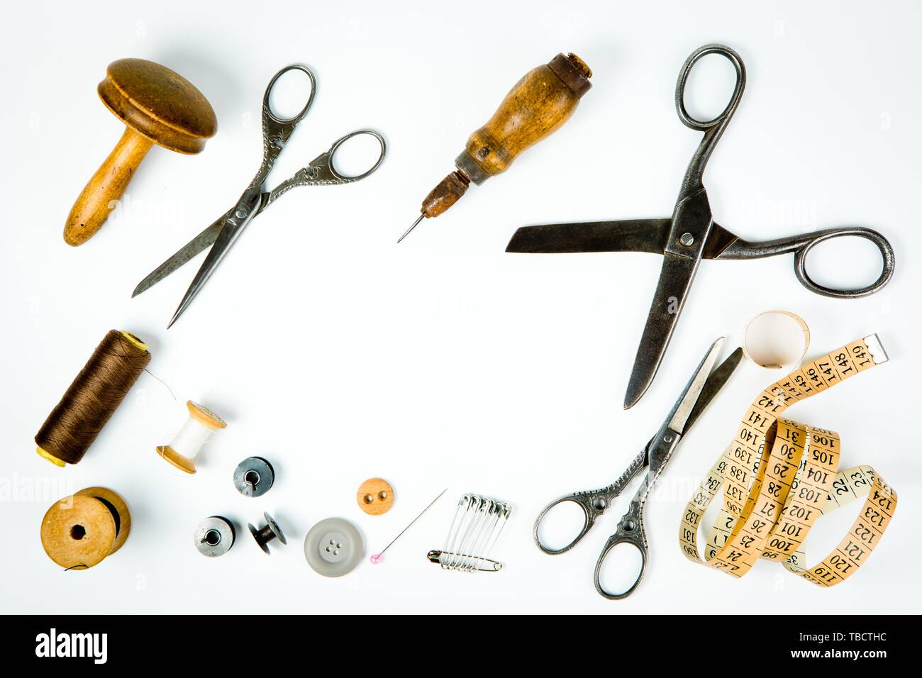 Classical tools for tailor, wooden and metal old instrument for hand ...