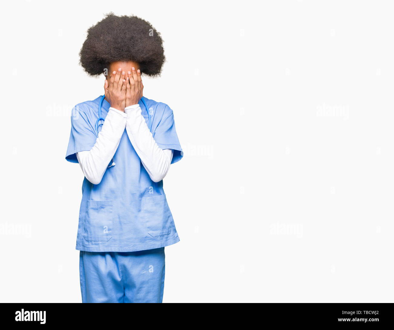Young african american doctor man with afro hair with sad expression ...