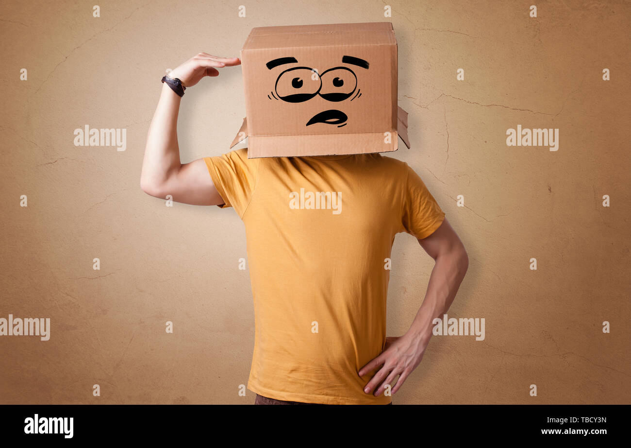 Man with cardboard box head Stock Photo - Alamy