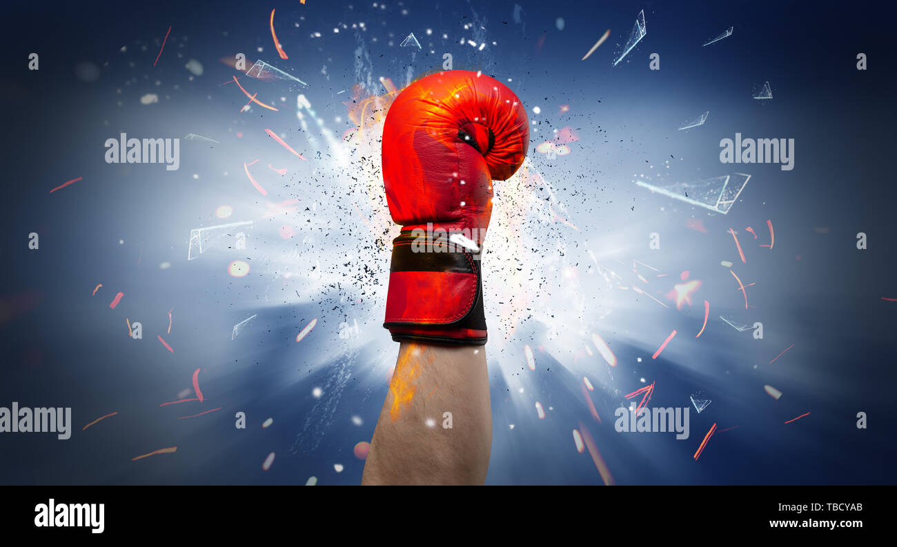 Hand hits strongly and makes fire beam around Stock Photo - Alamy