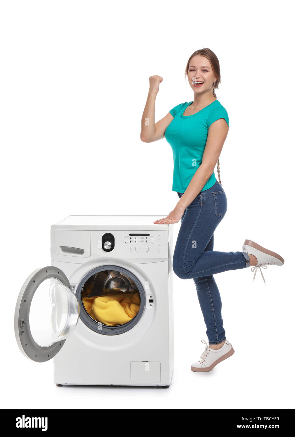 Happy young woman with washing machine on white background Stock Photo ...