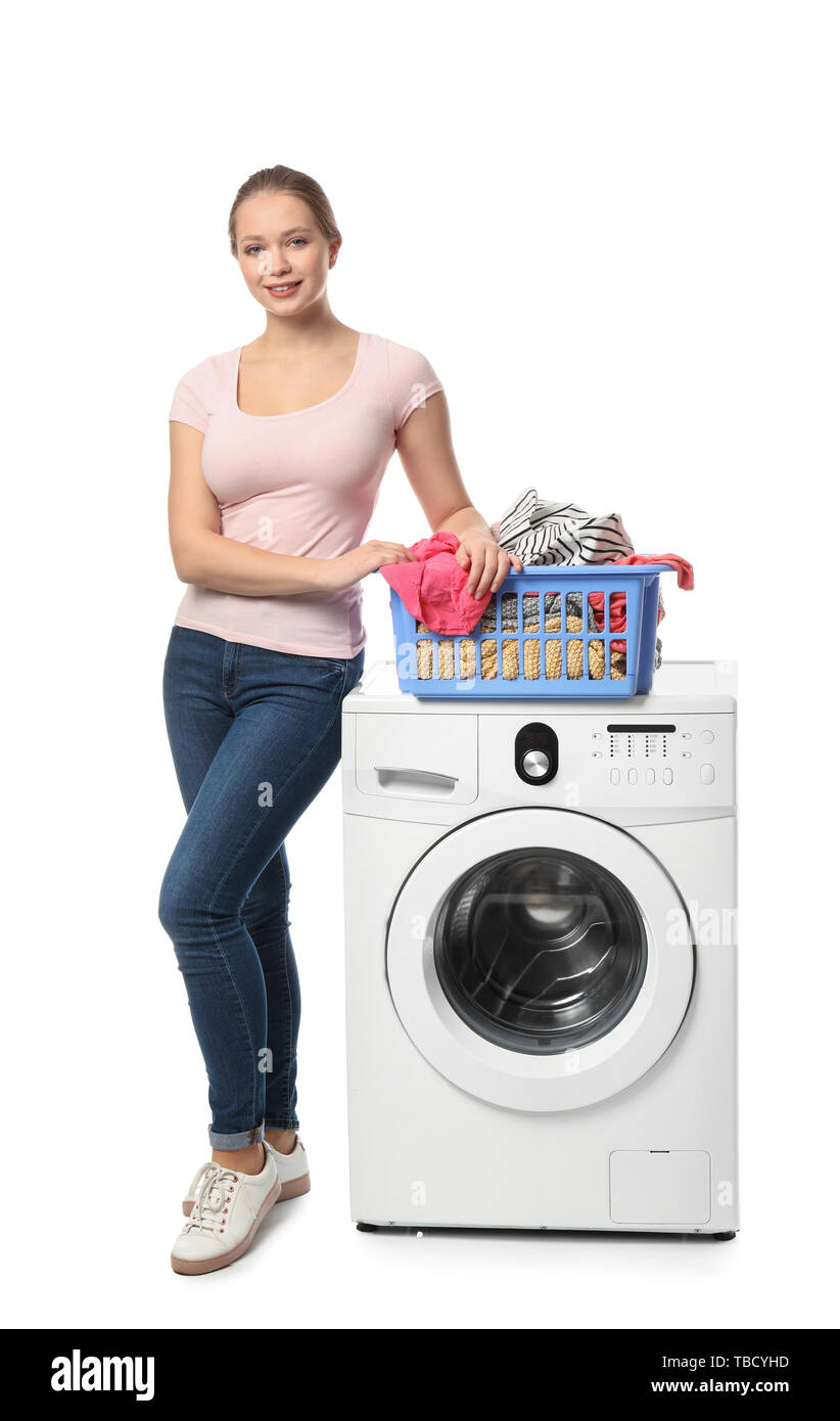 Young woman with washing machine on white background Stock Photo - Alamy