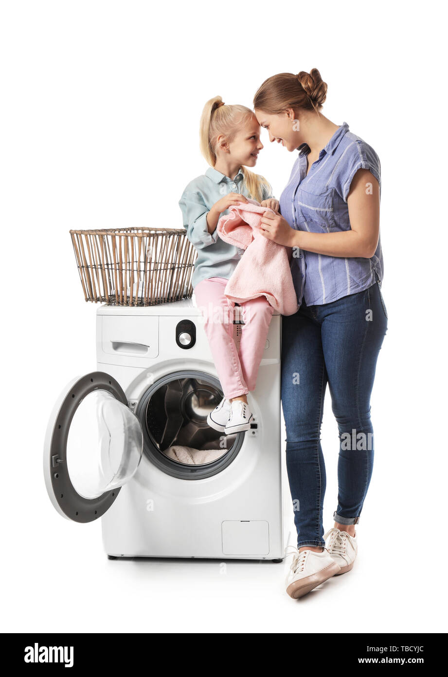 Child girl washing machine Cut Out Stock Images & Pictures - Alamy