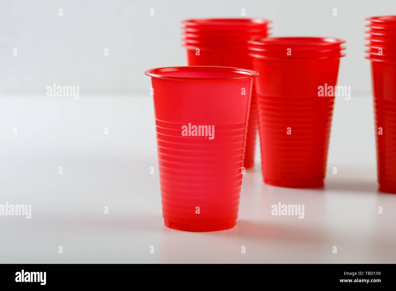 red disposable plastic glasses Stock Photo - Alamy