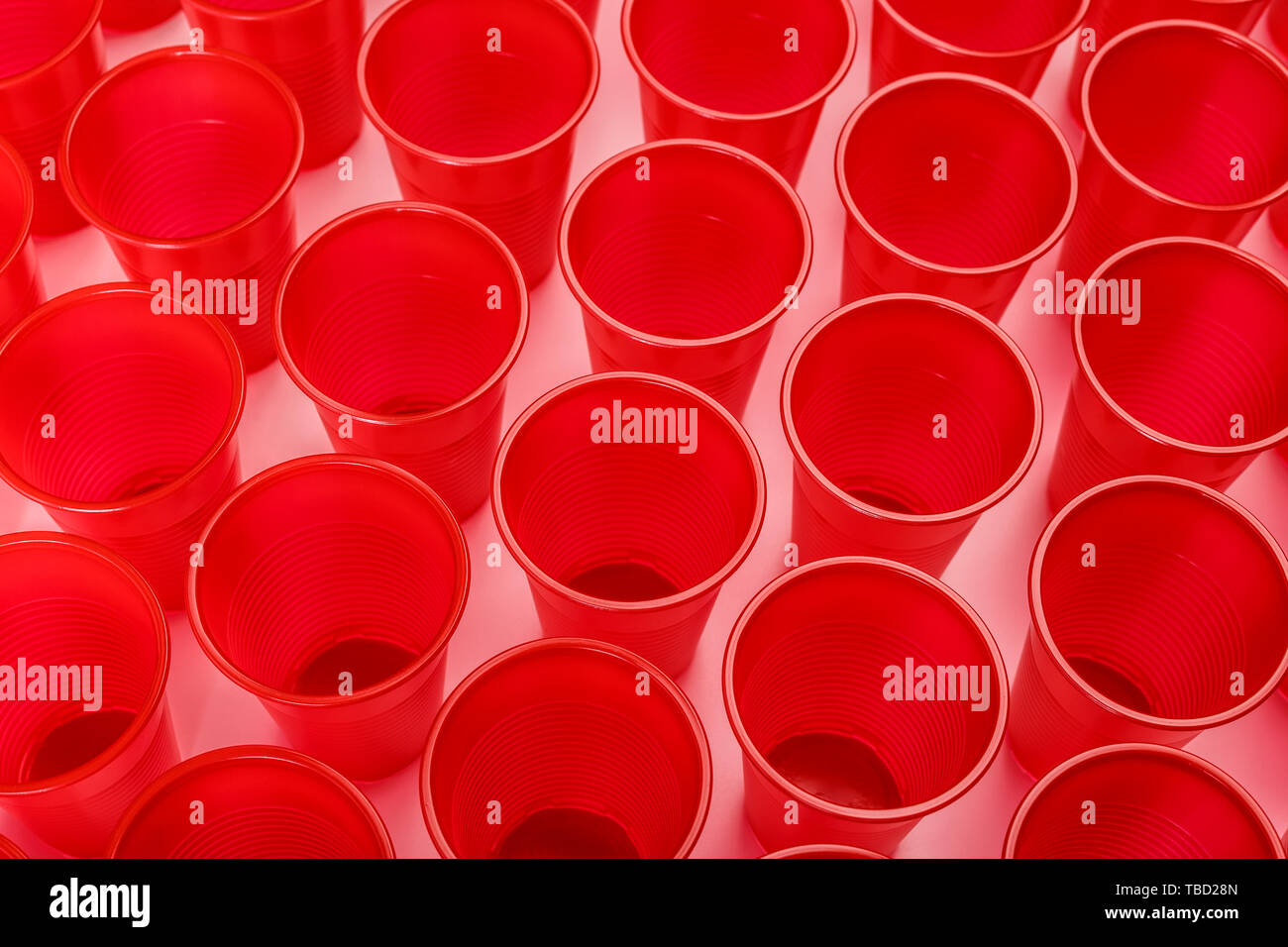 red disposable plastic glasses Stock Photo - Alamy