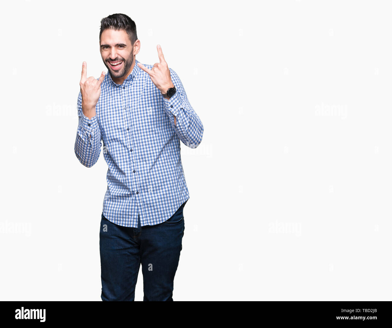 Young handsome man over isolated background shouting with crazy ...