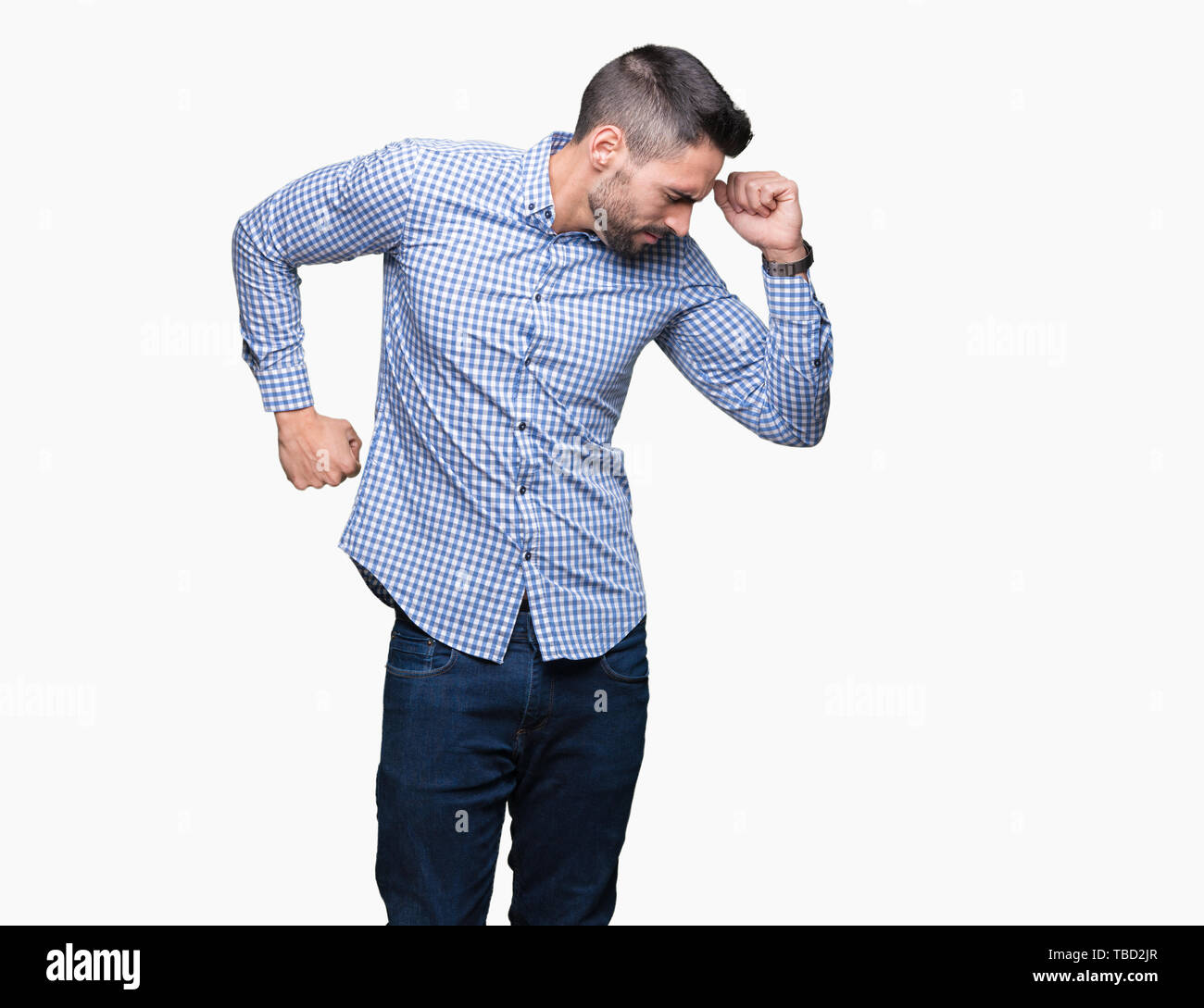 Young handsome man over isolated background stretching back, tired and ...