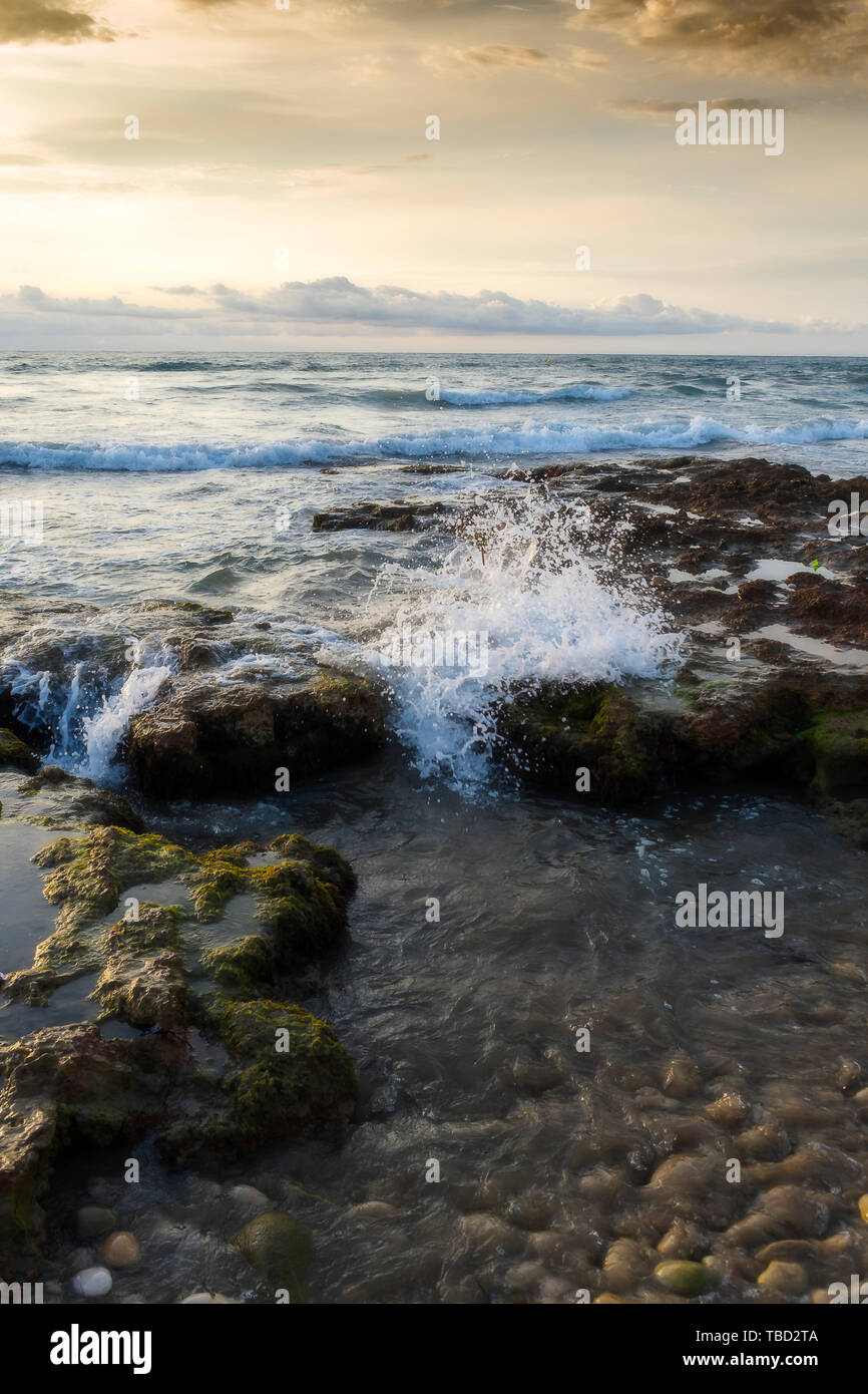 Sunrise on the beach in Spain Stock Photo - Alamy