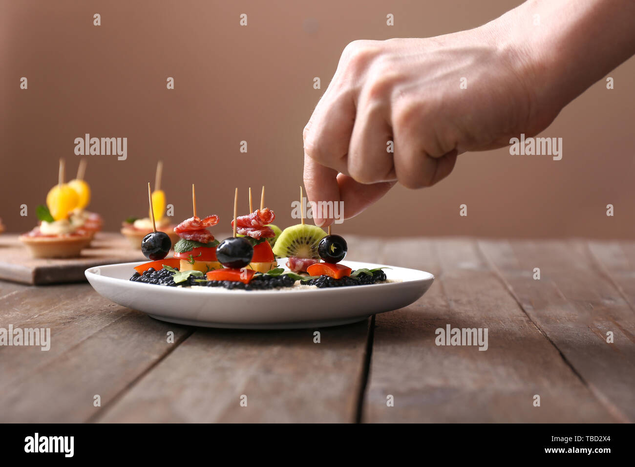 Female hand tasty canapes hi-res stock photography and images - Alamy