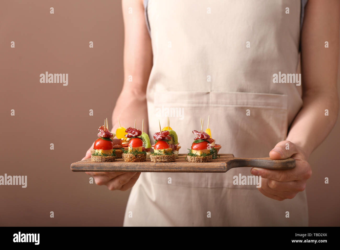 Canapes woman hi-res stock photography and images - Alamy