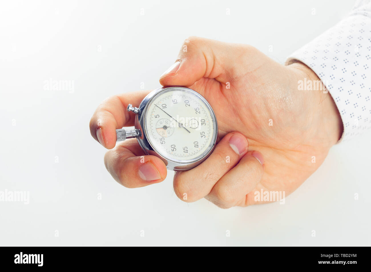 Close up of hand holding stopwatch, isolated on white background Stock ...