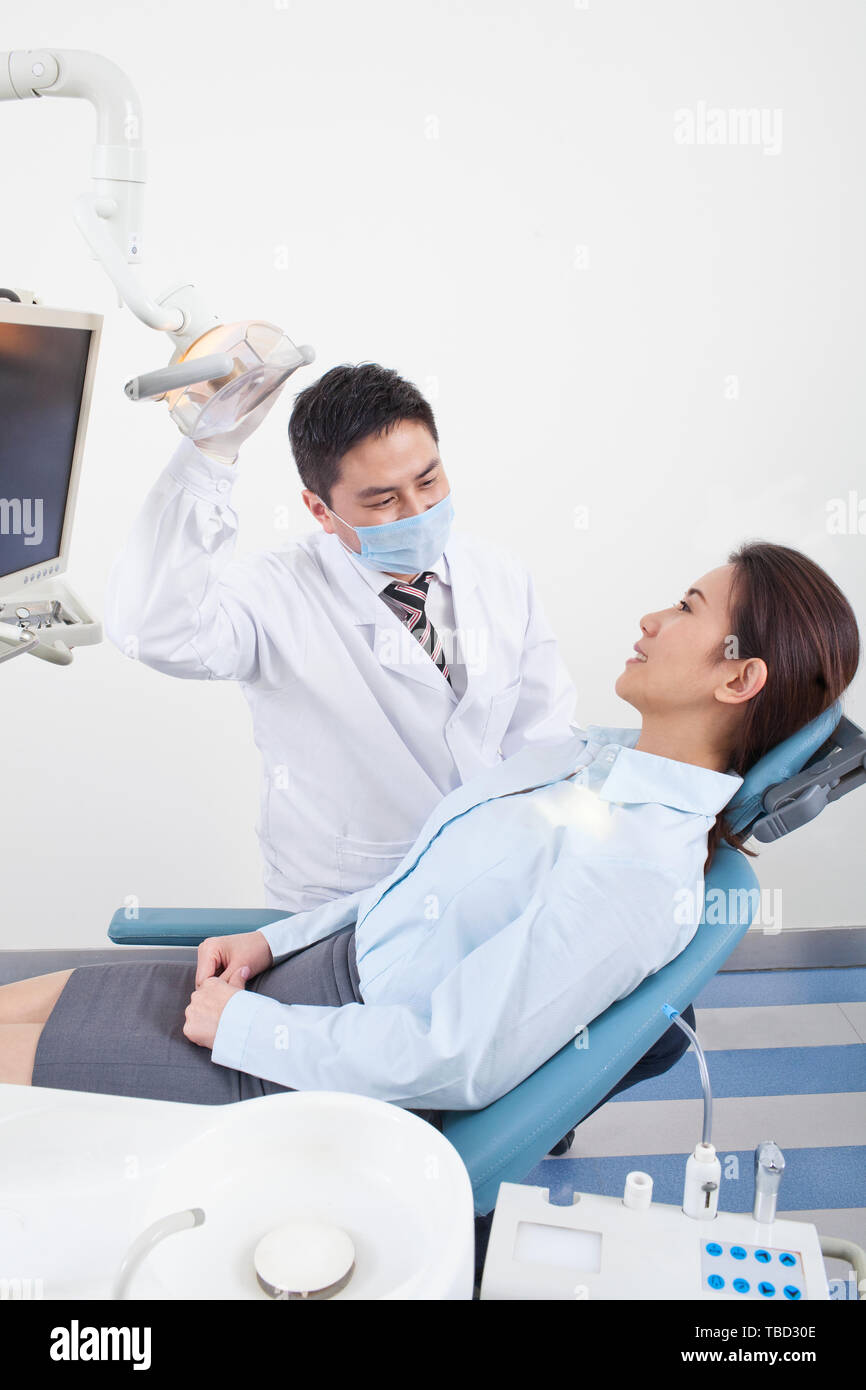 Oral examination in the clinic Stock Photo - Alamy