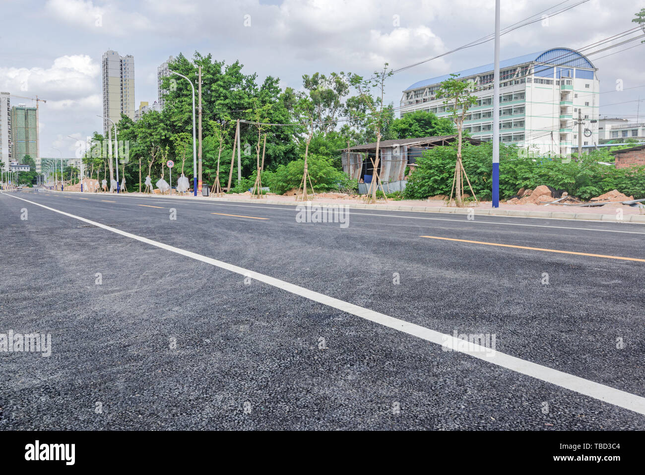 Suburban asphalt road Stock Photo - Alamy