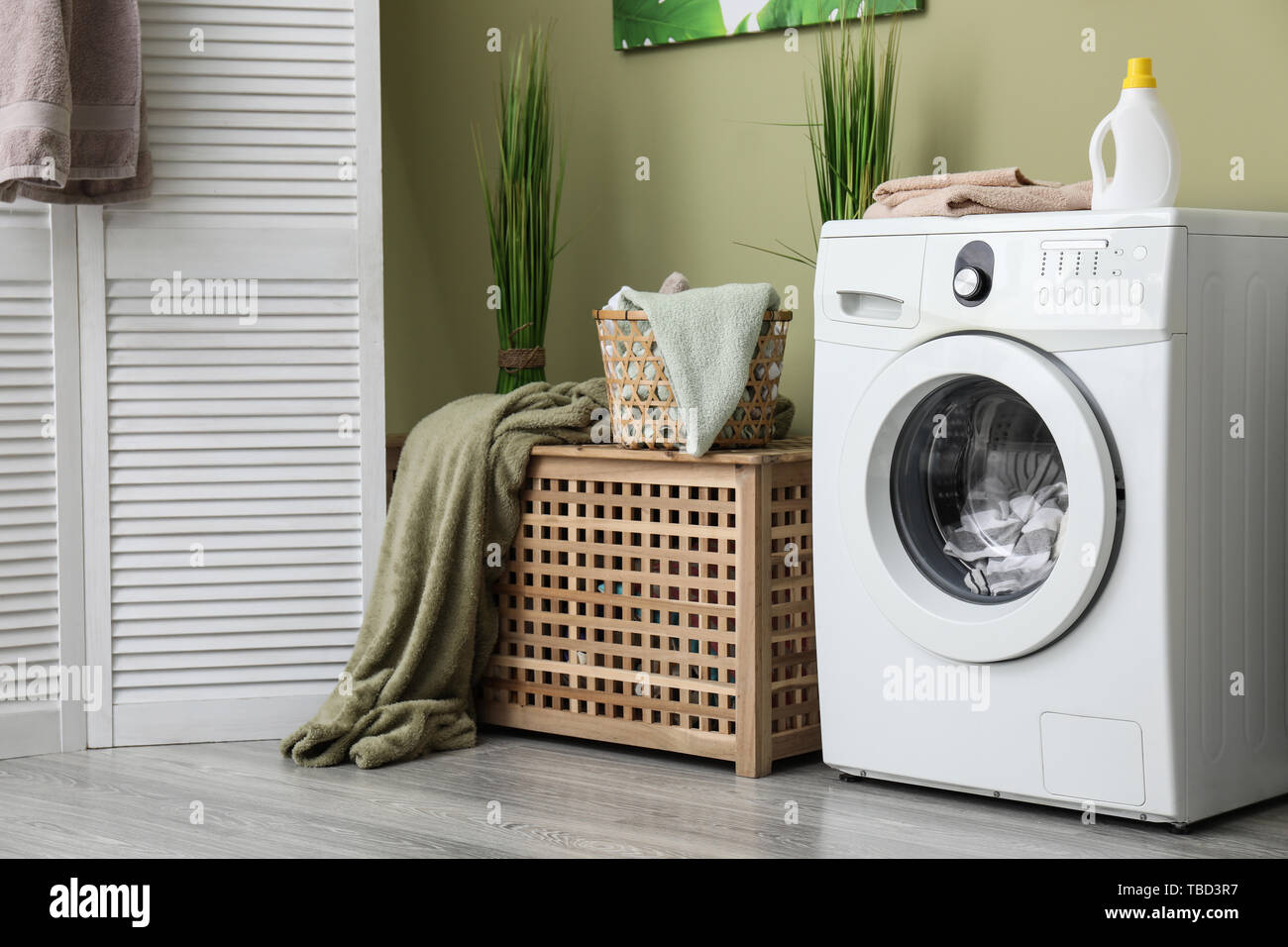 Interior of home laundry room with modern washing machine Stock Photo ...
