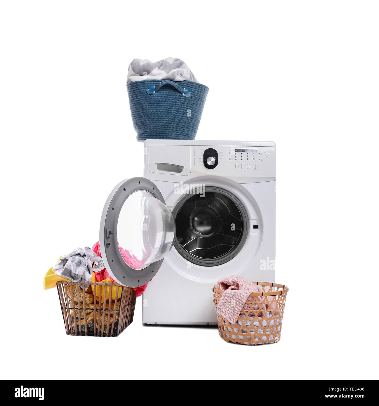 Modern washing machine and laundry on white background Stock Photo - Alamy