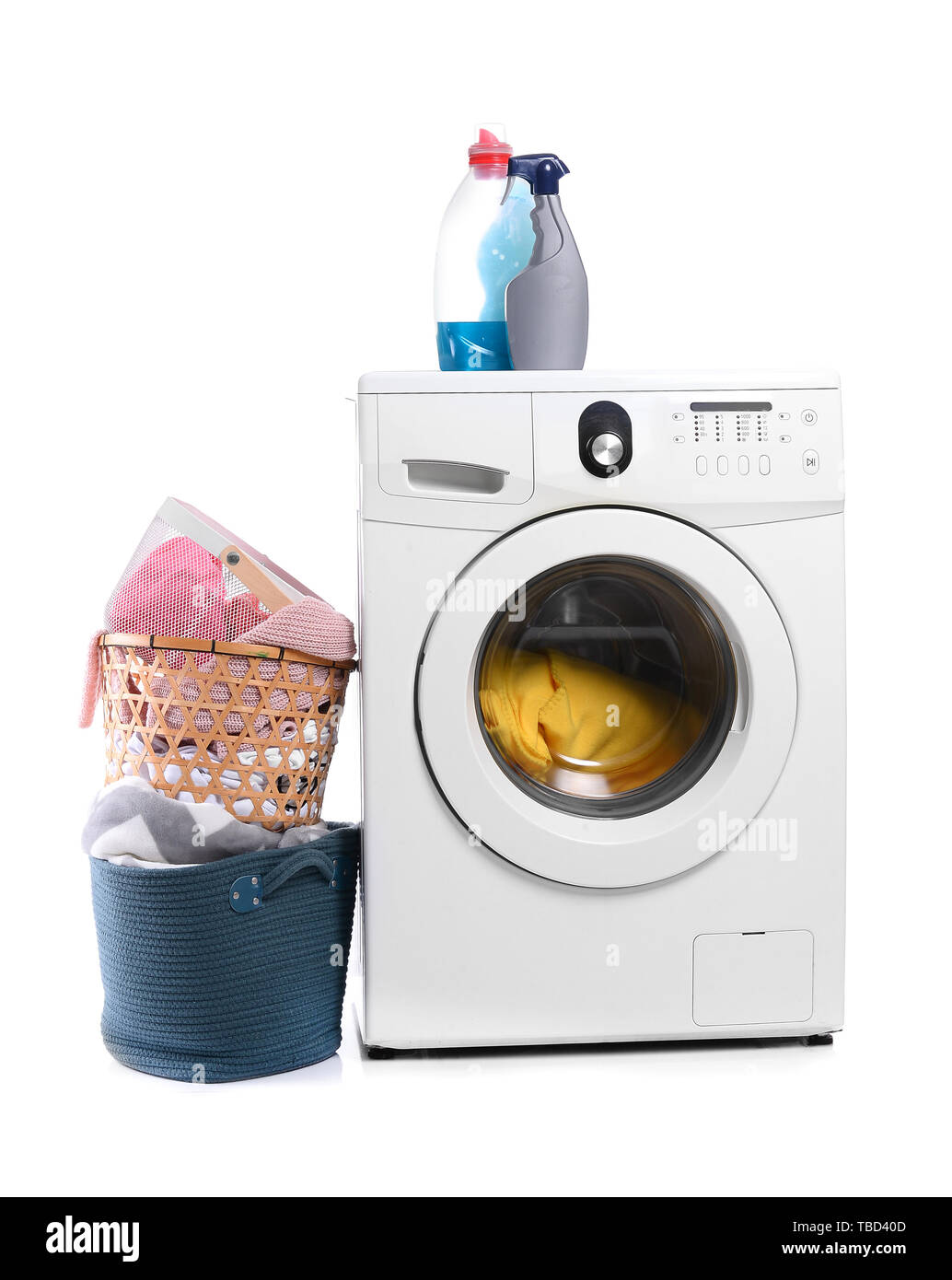 Modern washing machine and laundry on white background Stock Photo - Alamy