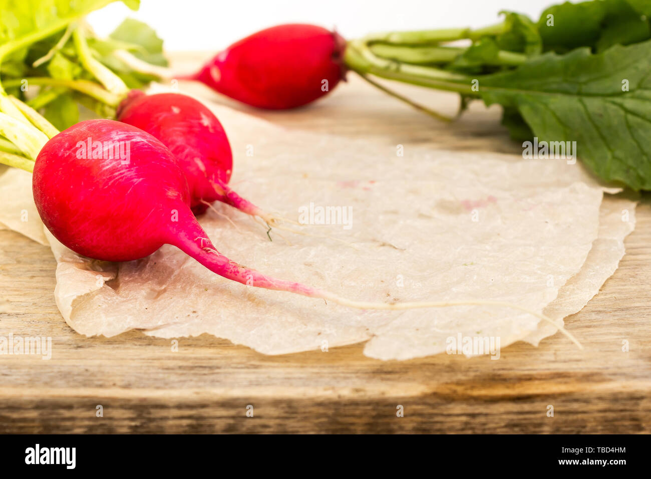 Fruits of red radish on wooden table. Dietary, healthy food. Harvest in ...
