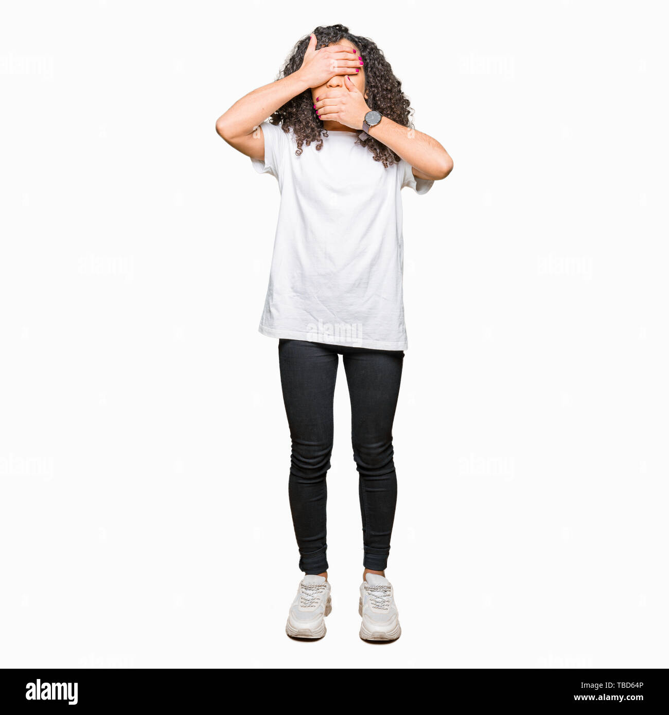 Young Beautiful Woman With Curly Hair Wearing White T Shirt Covering