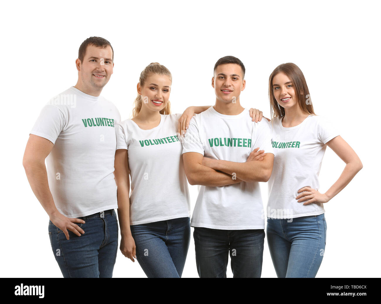 Team of young volunteers on white background Stock Photo - Alamy