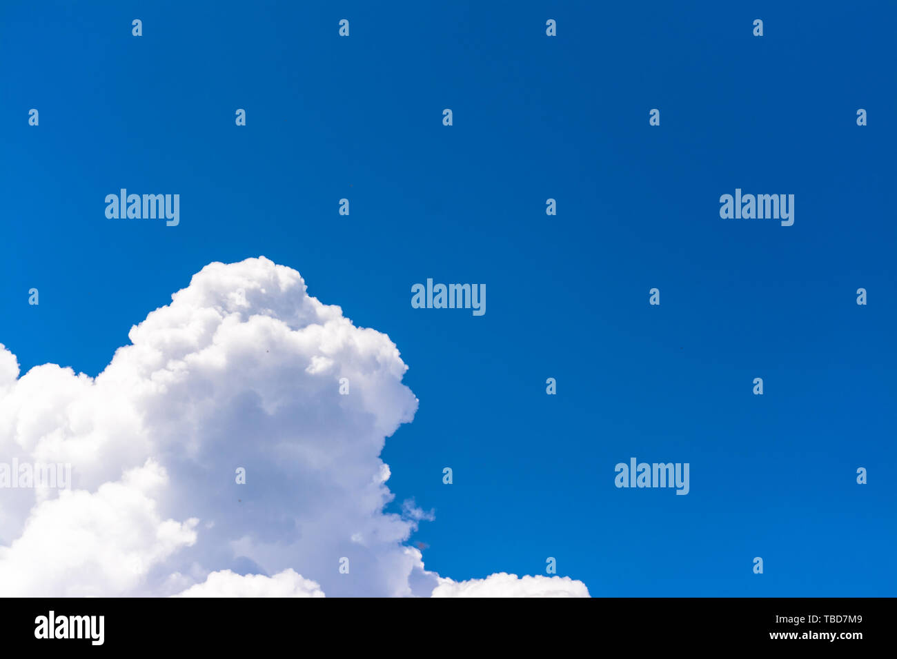 Cloudscape with fuffy clouds in spring Stock Photo - Alamy