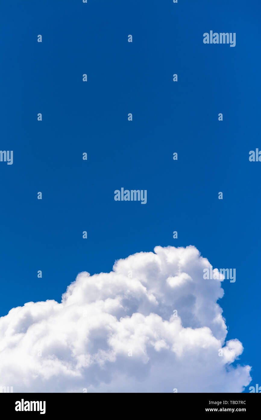 Cloudscape with fuffy clouds in spring Stock Photo - Alamy