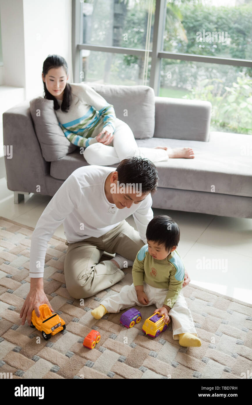 Parents and children play games Stock Photo - Alamy