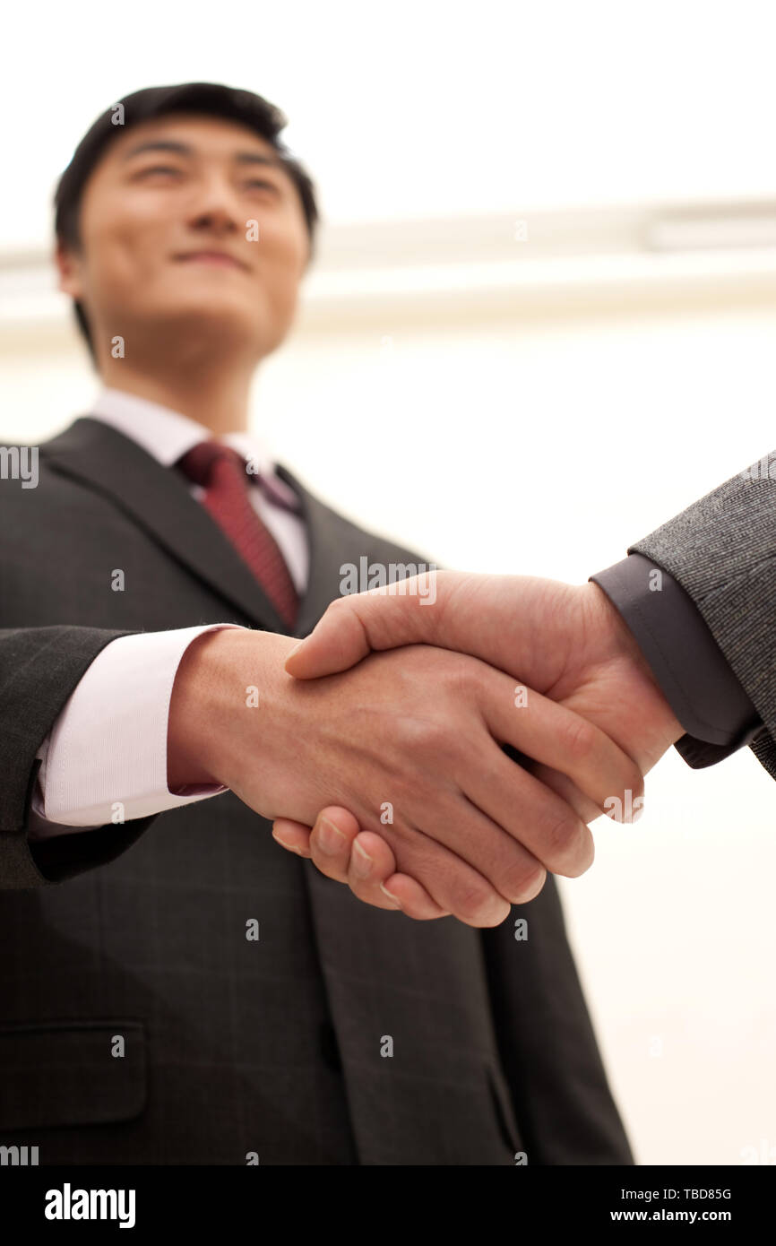 Business people shake hands Stock Photo - Alamy