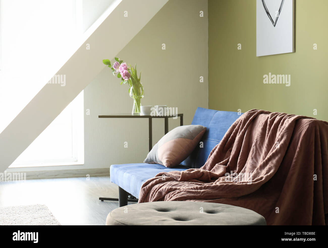 Soft couch in interior of living room Stock Photo - Alamy