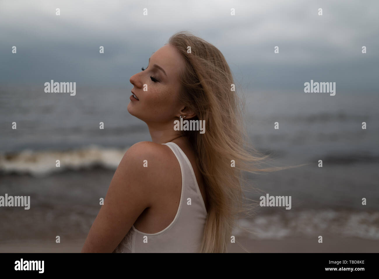 Silhouette woman beautiful wind sky clouds hi-res stock photography and ...