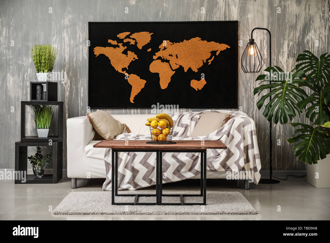 Interior of modern room with picture of world map on wall Stock Photo ...