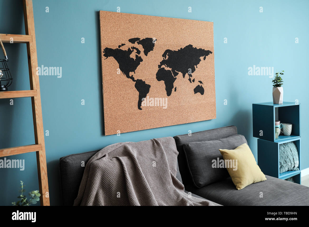 Interior of modern room with picture of world map on wall Stock Photo ...