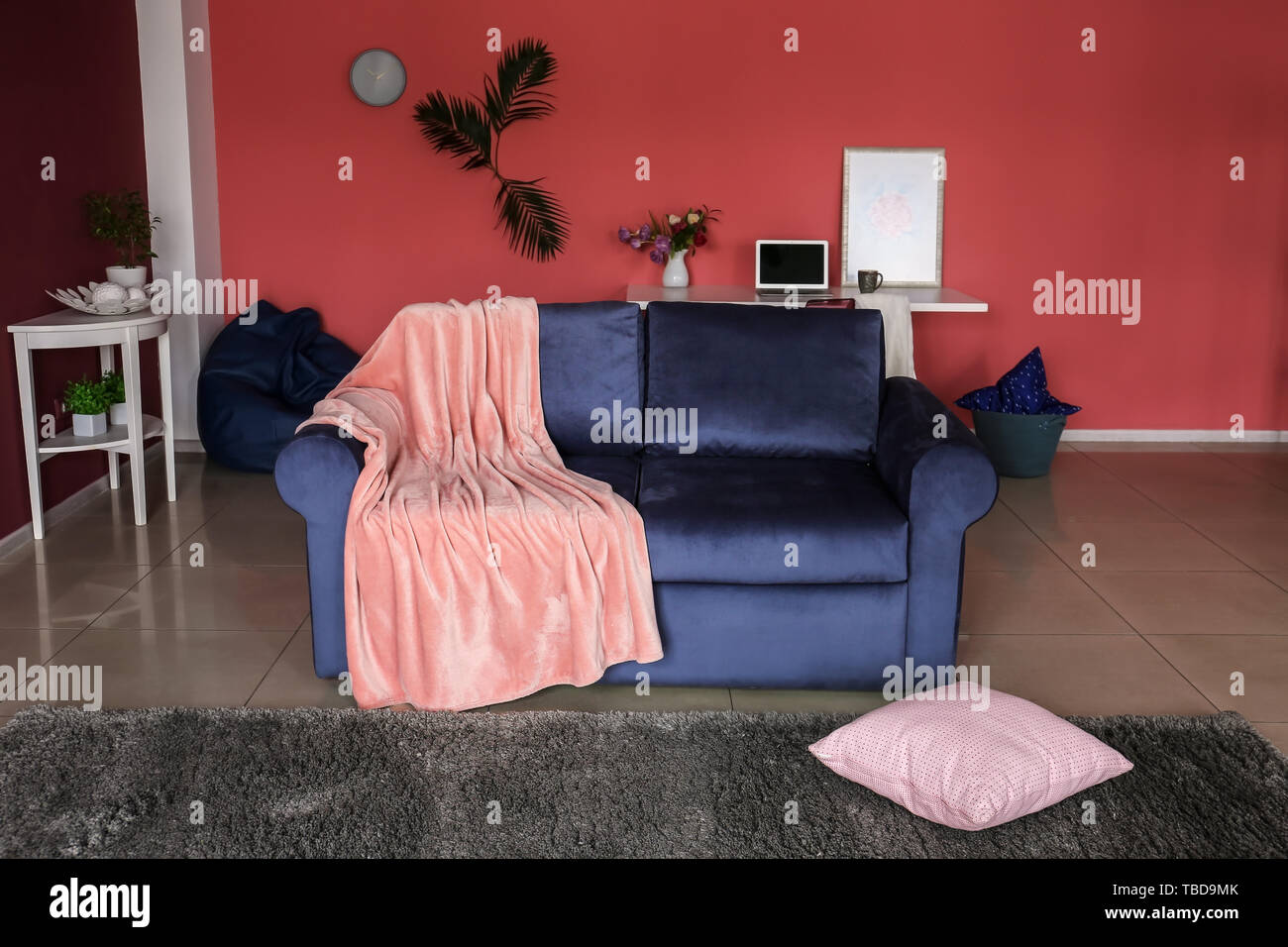 Interior of modern room with comfortable sofa Stock Photo - Alamy
