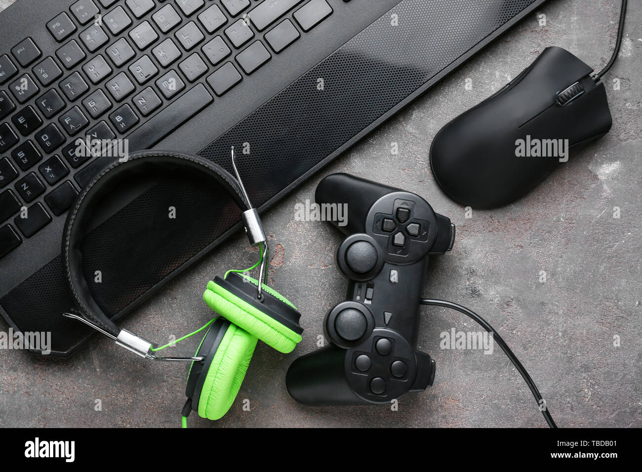 Modern gaming accessories on grey background Stock Photo - Alamy