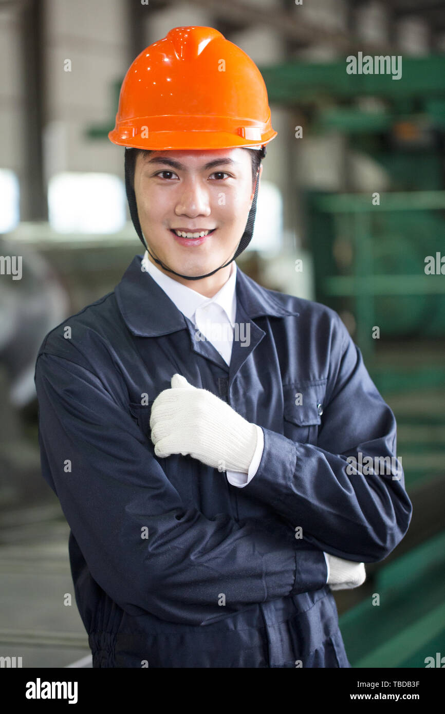 Male workers, chinese factory hi-res stock photography and images - Alamy