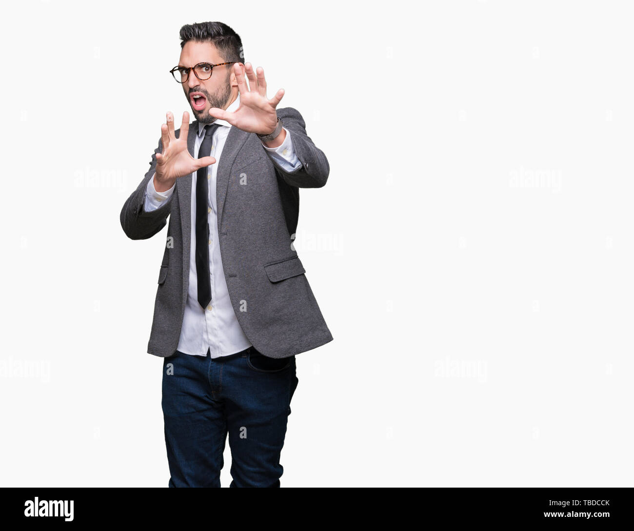 Young handsome business man over isolated background afraid and ...