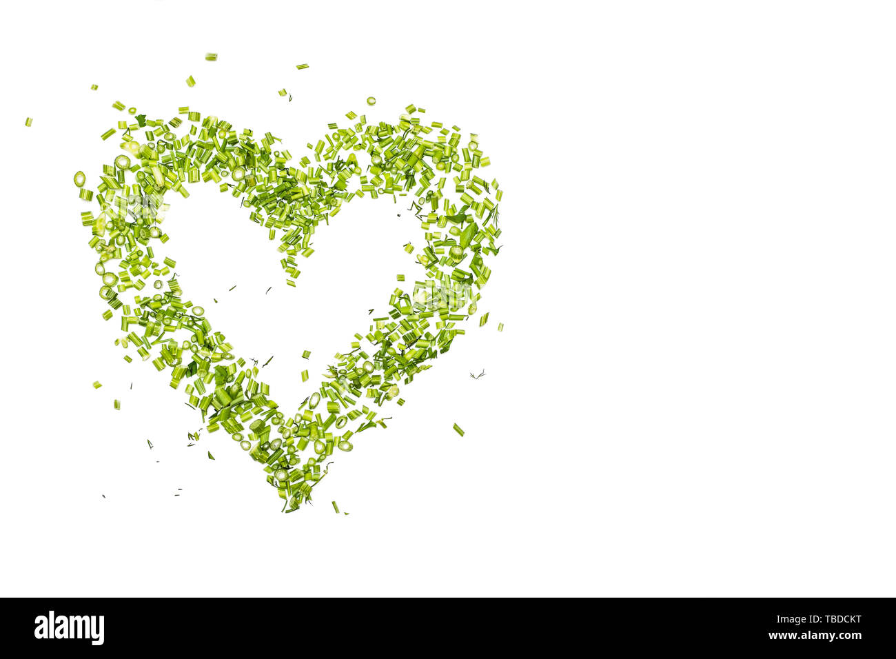 green heart of chopped parsley and dill on white background Stock Photo ...