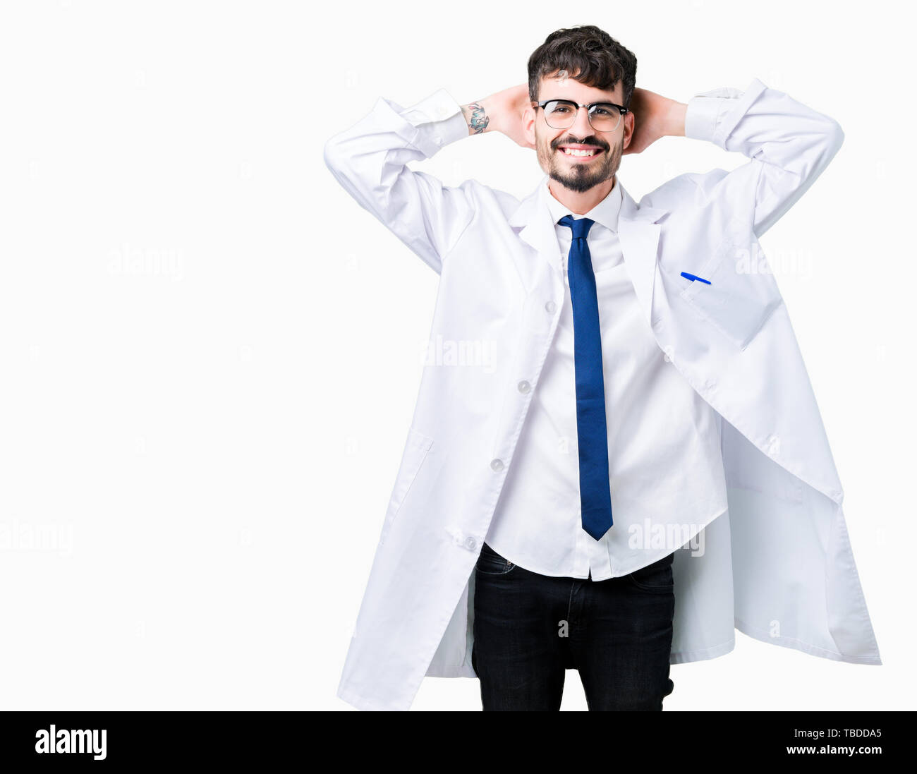 Young professional scientist man wearing white coat over isolated ...