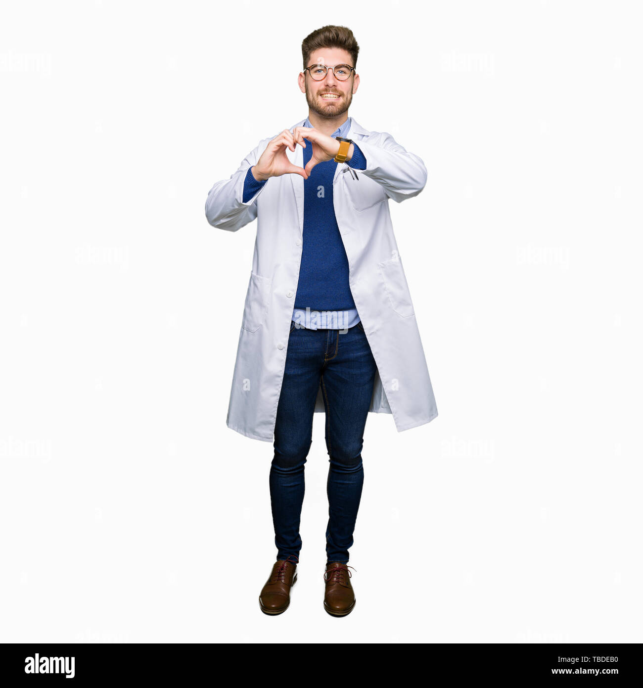 Young handsome scientist man wearing glasses smiling in love showing ...