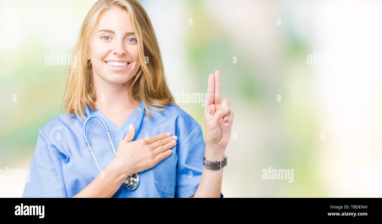Beautiful young doctor woman wearing medical uniform over isolated ...