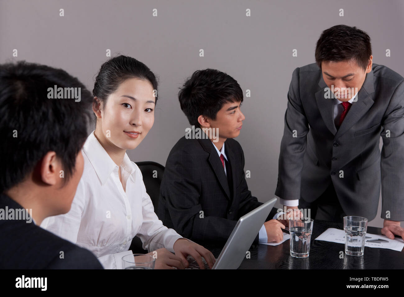 A team is meeting in a conference room Stock Photo - Alamy
