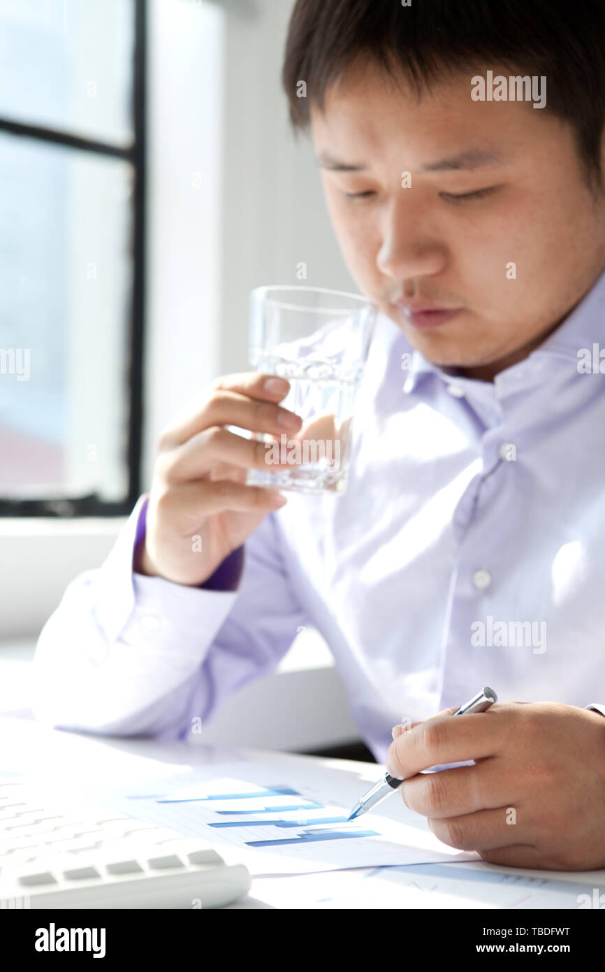 A white-collar man in the office Stock Photo - Alamy
