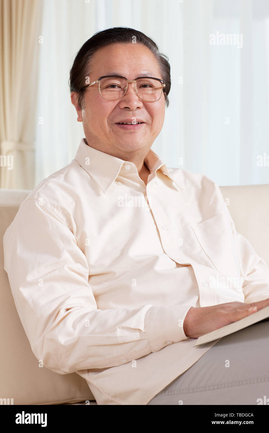 The elderly read books and enjoy their old age Stock Photo - Alamy