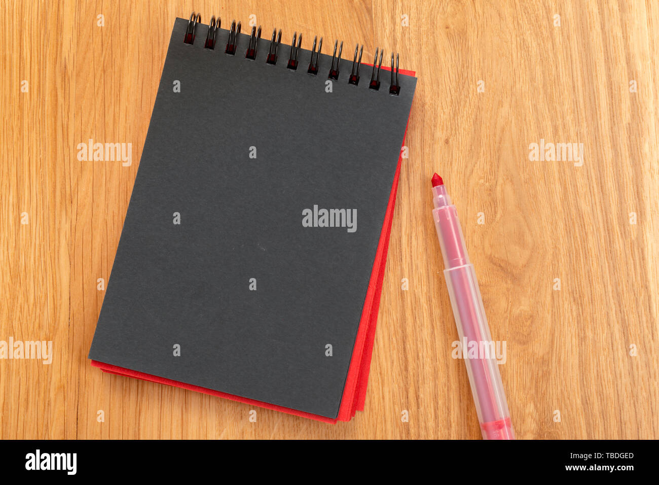 Notebook and pencils Stock Photo - Alamy