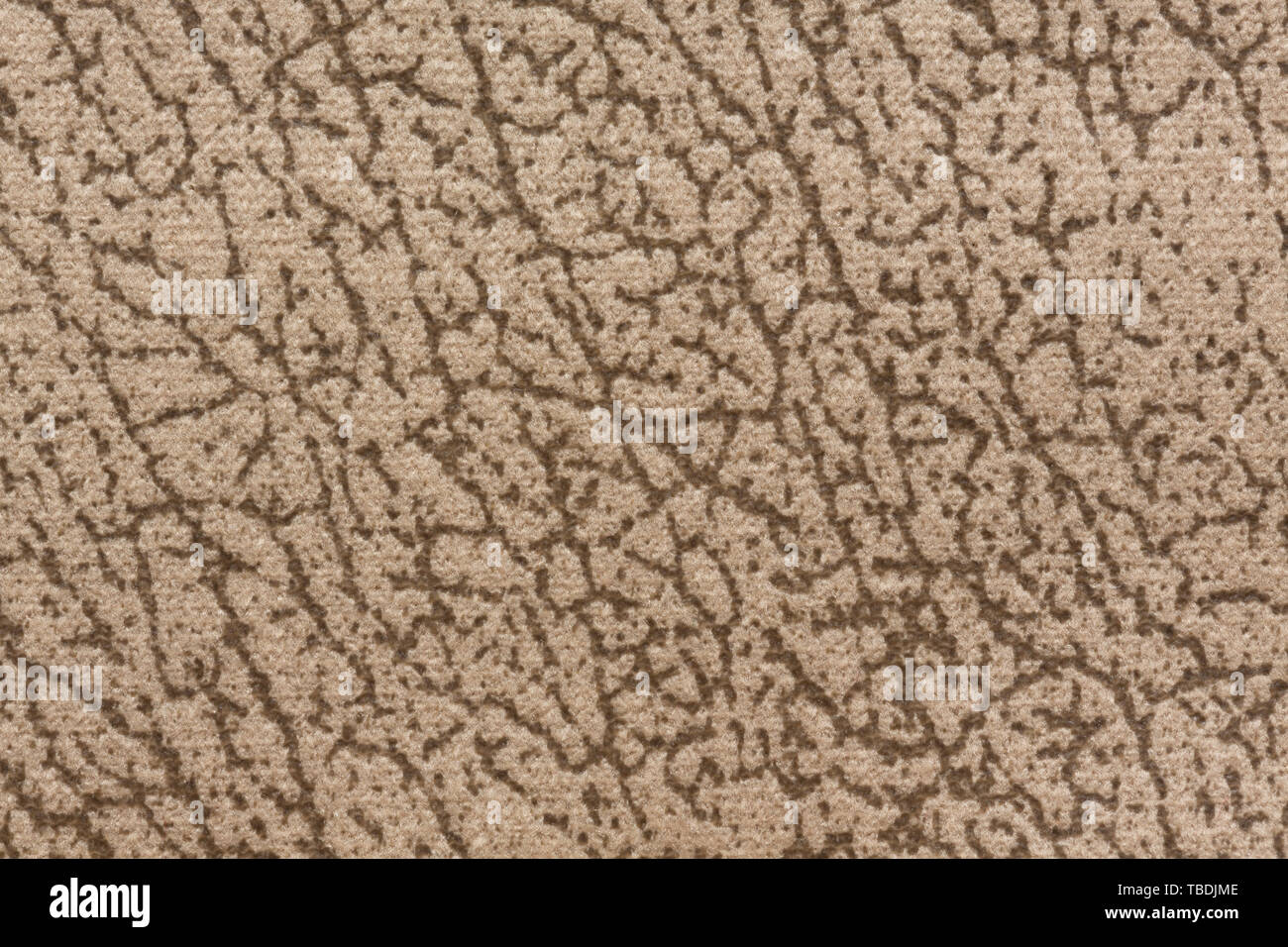 Unusual textile background with mottled surface on light beige colors ...